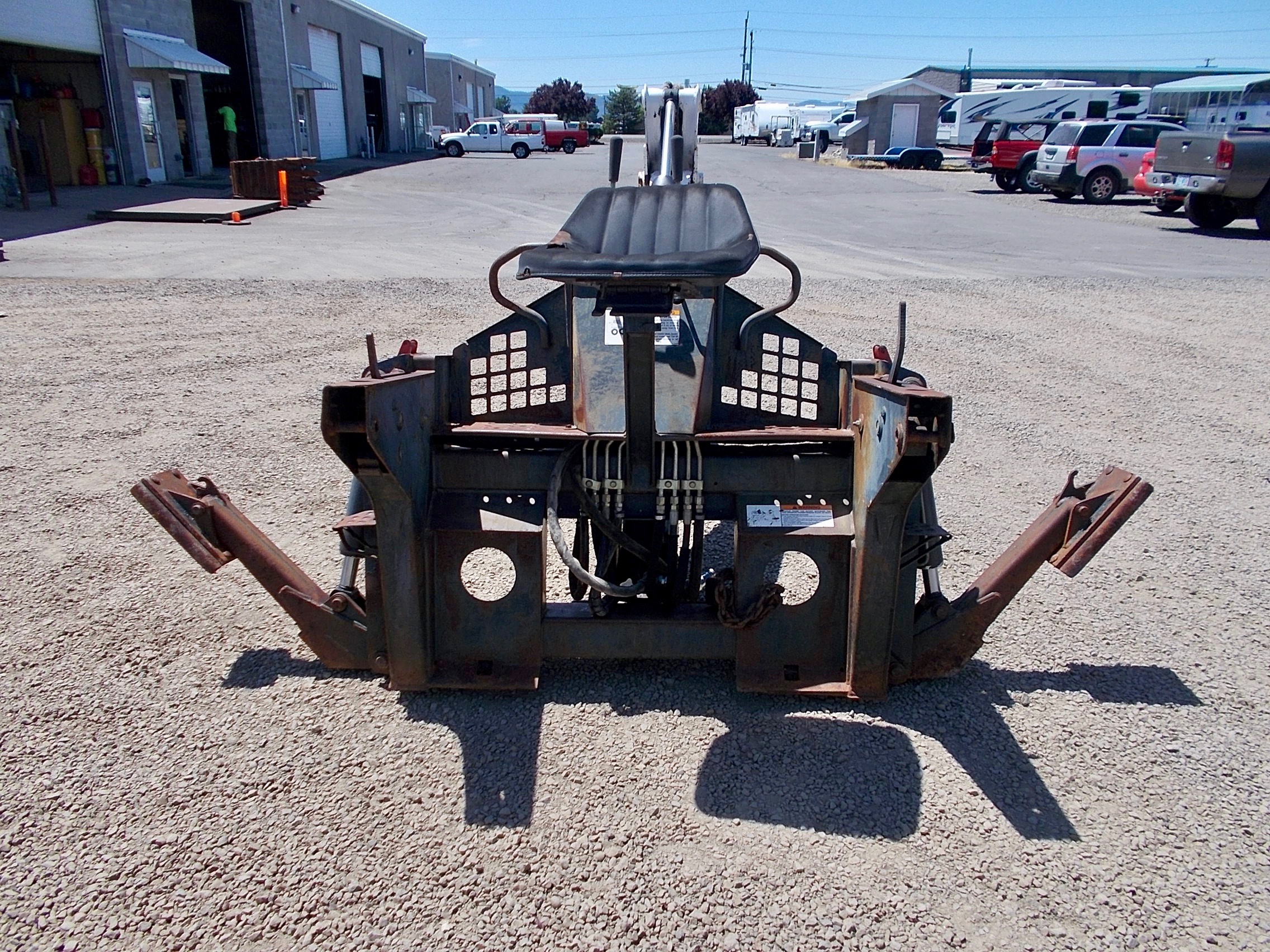Attachment Zone - Used Backhoe Attachment for Skid Steer For Sale